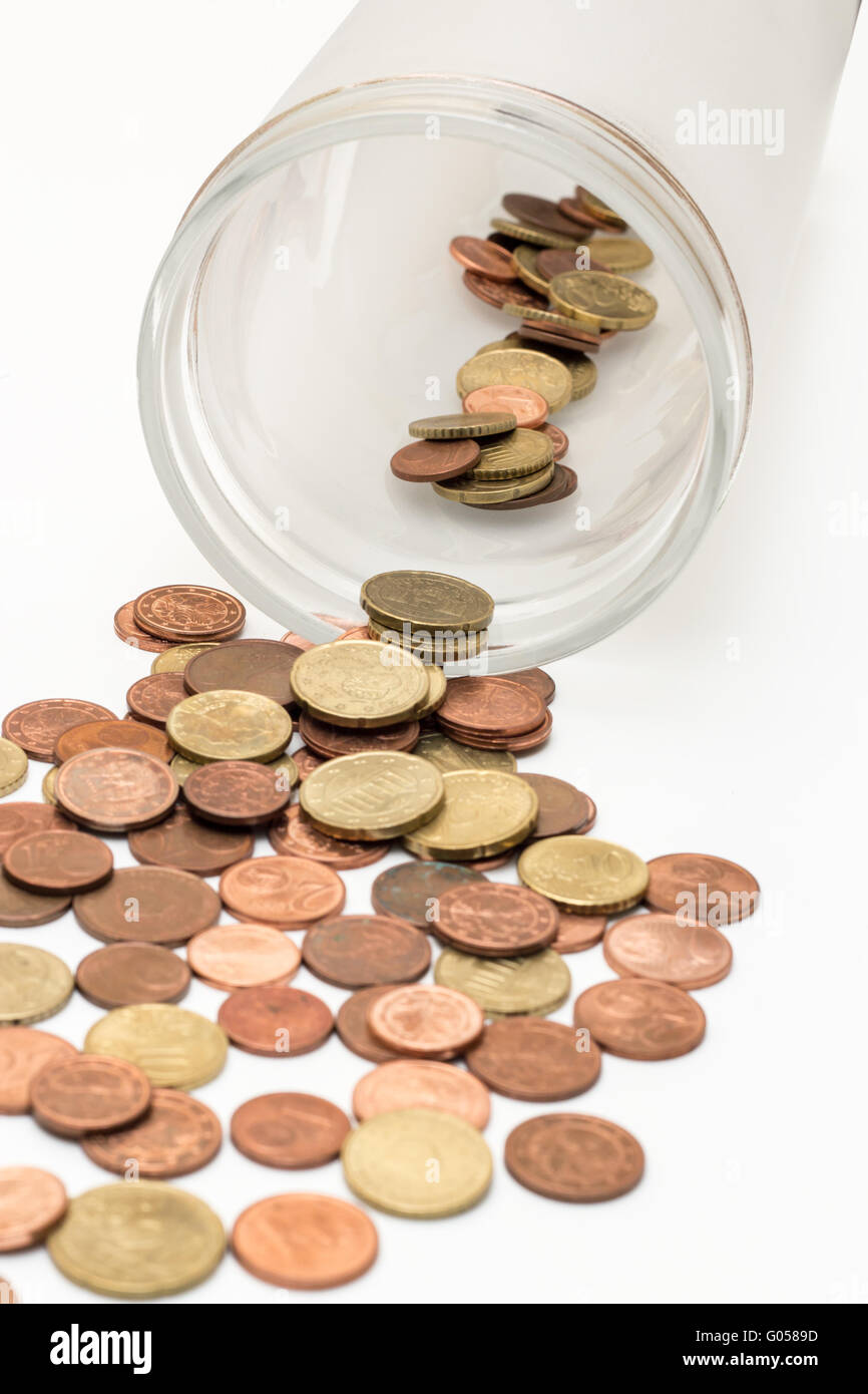 Euro cents are tilted from the coin glas Stock Photo - Alamy