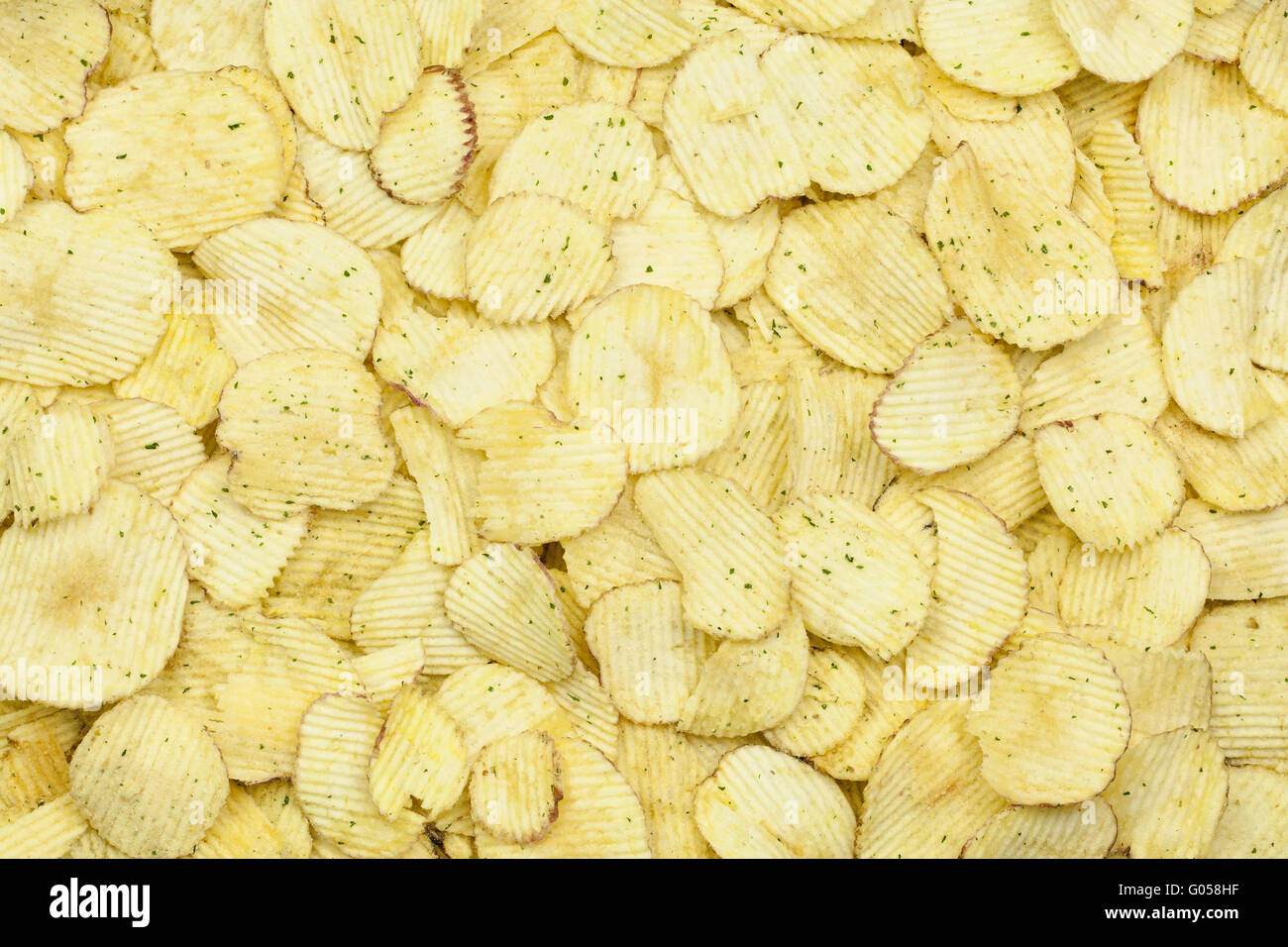 Potato chips with sour cream and spring onions Stock Photo - Alamy