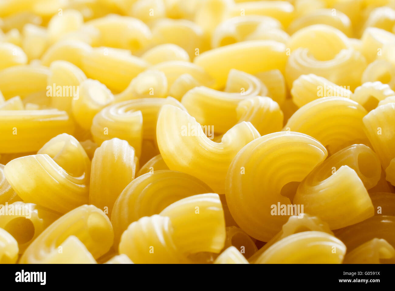 Macaroni closeup background Stock Photo - Alamy