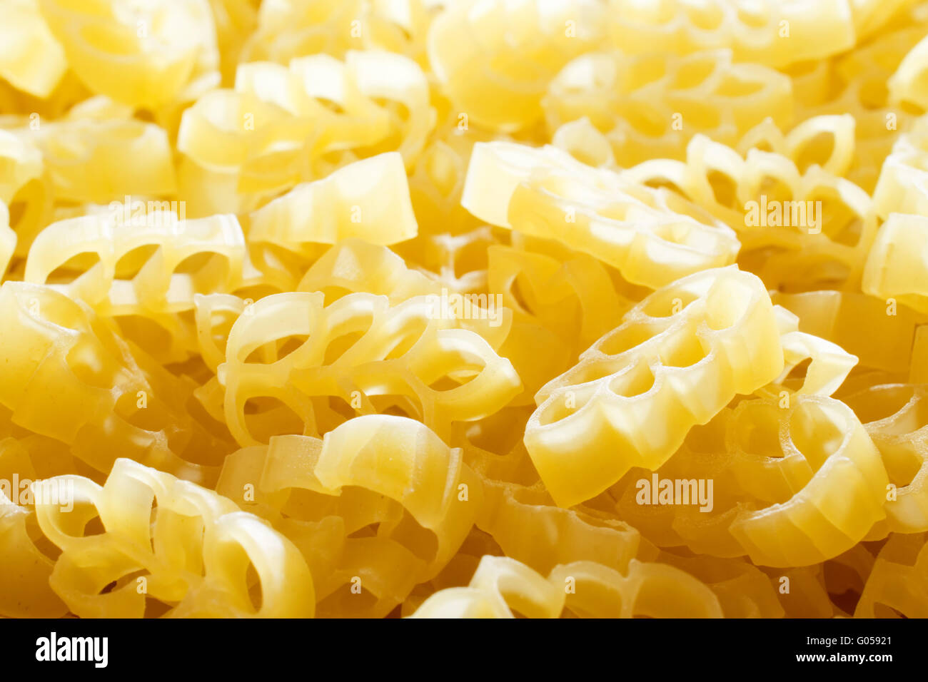Macaroni closeup background Stock Photo - Alamy