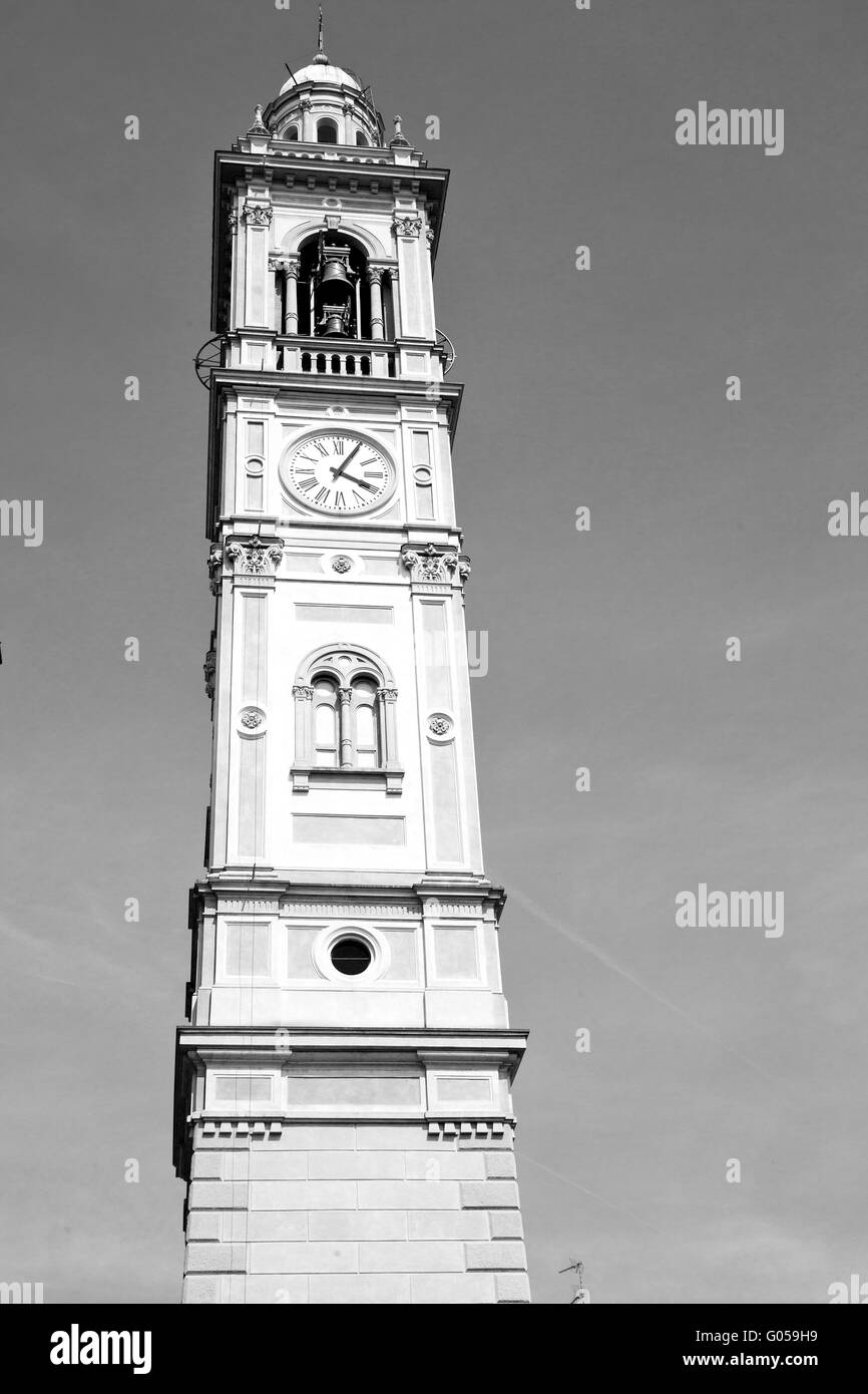 ancien clock tower in italy europe old stone and bell Stock Photo - Alamy