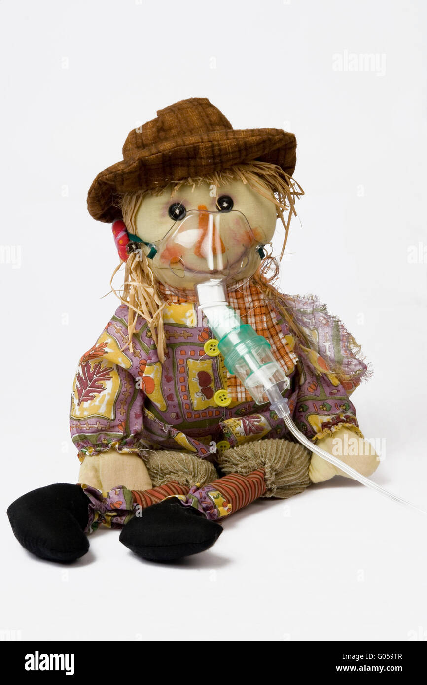 Rag Scarecrow With Medicinal Mask Stock Photo - Alamy