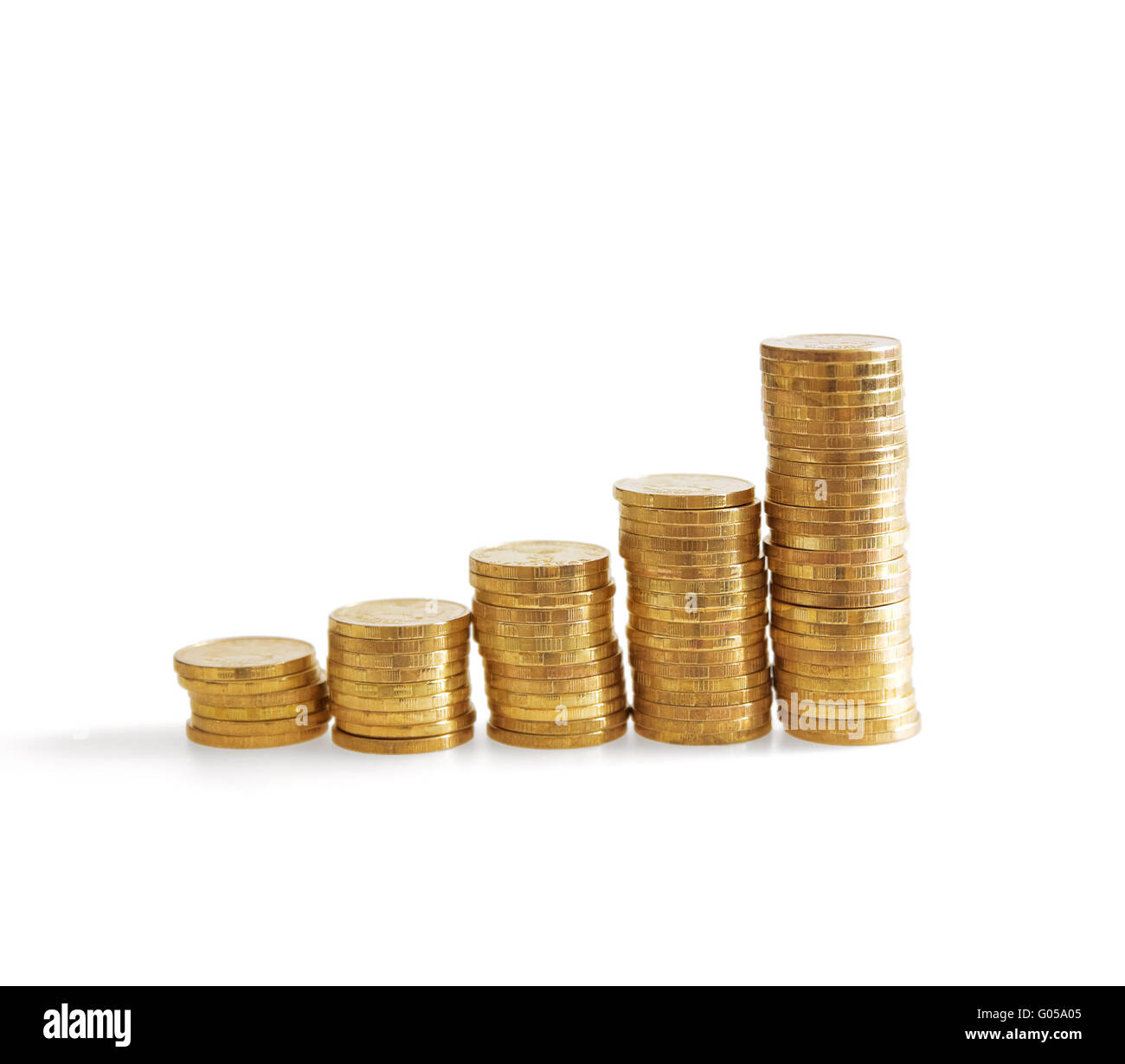 Column of golden coins on a white background Stock Photo - Alamy