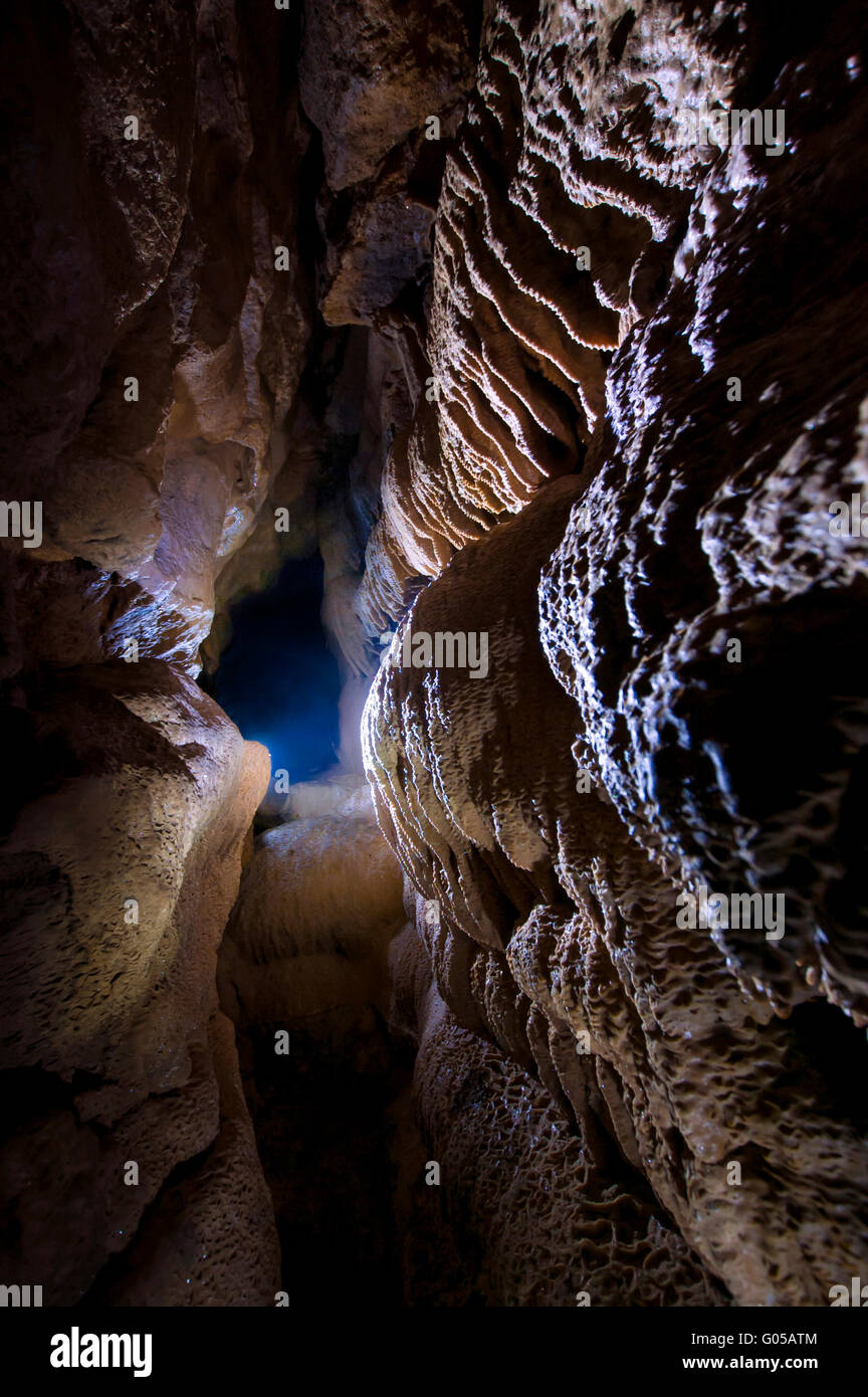 light at the entrance of a dark cave Stock Photo - Alamy