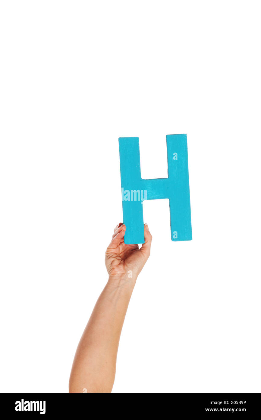 hand holding up the letter H from the bottom Stock Photo - Alamy