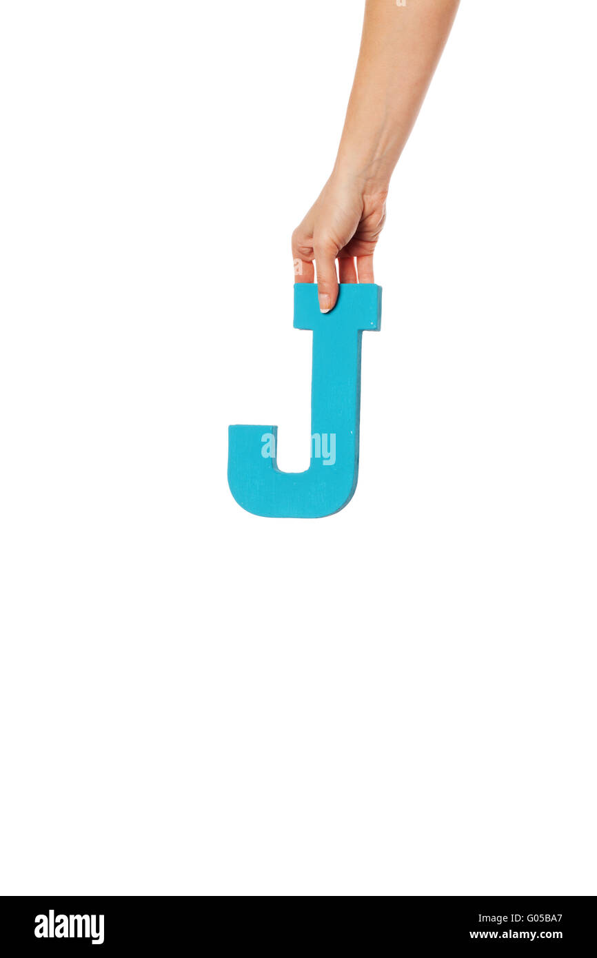 hand holding up the letter J from the top Stock Photo - Alamy