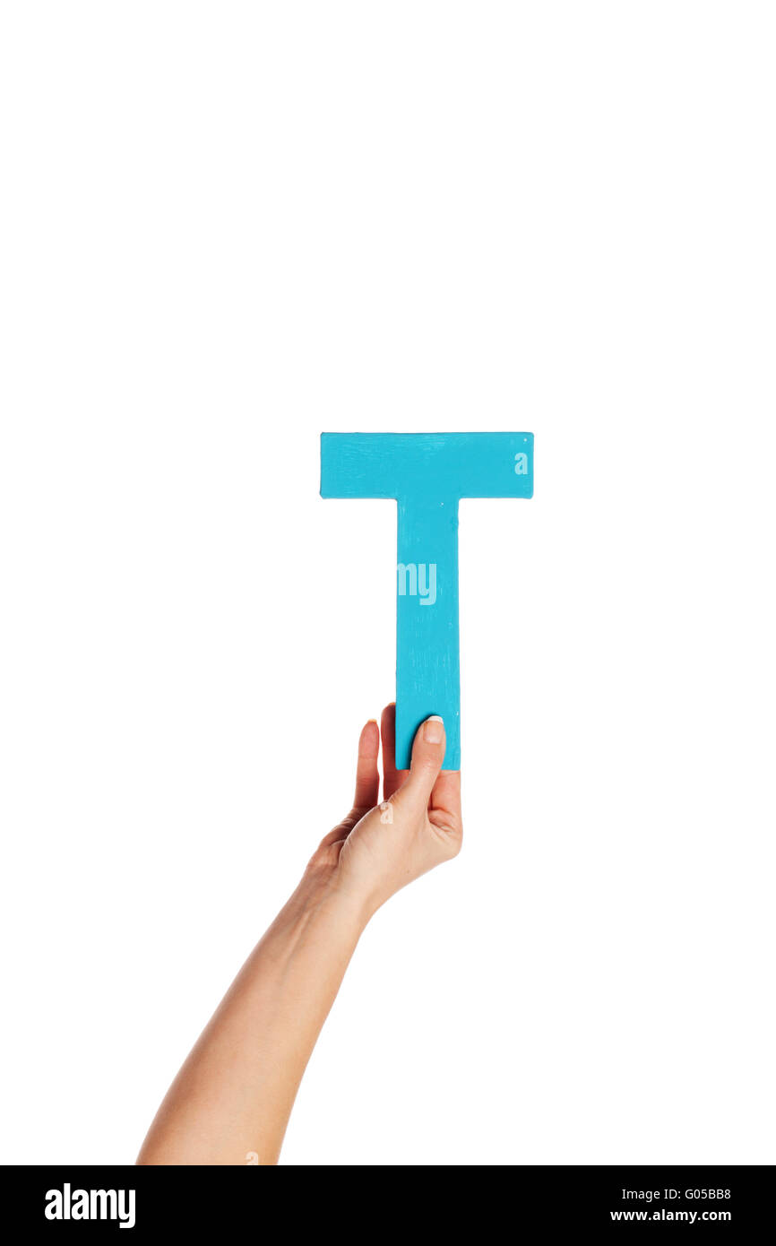 hand holding up the letter T from the bottom Stock Photo - Alamy