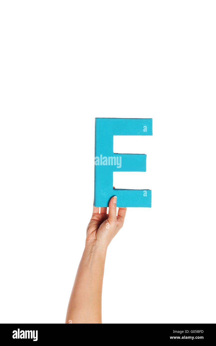 hand holding up the letter E from the bottom Stock Photo - Alamy