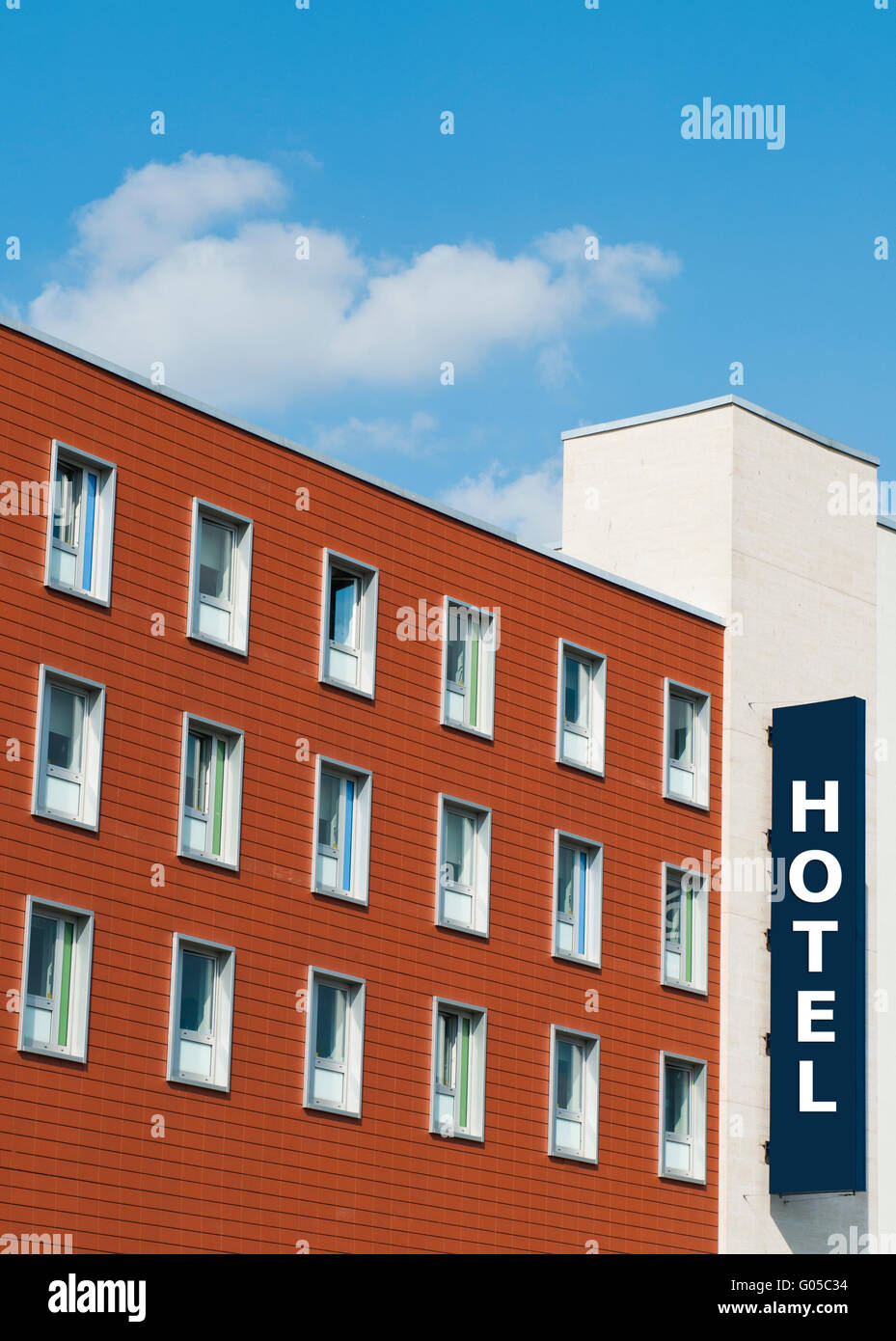 facade of a modern red brick Hotel building with sign Stock Photo - Alamy