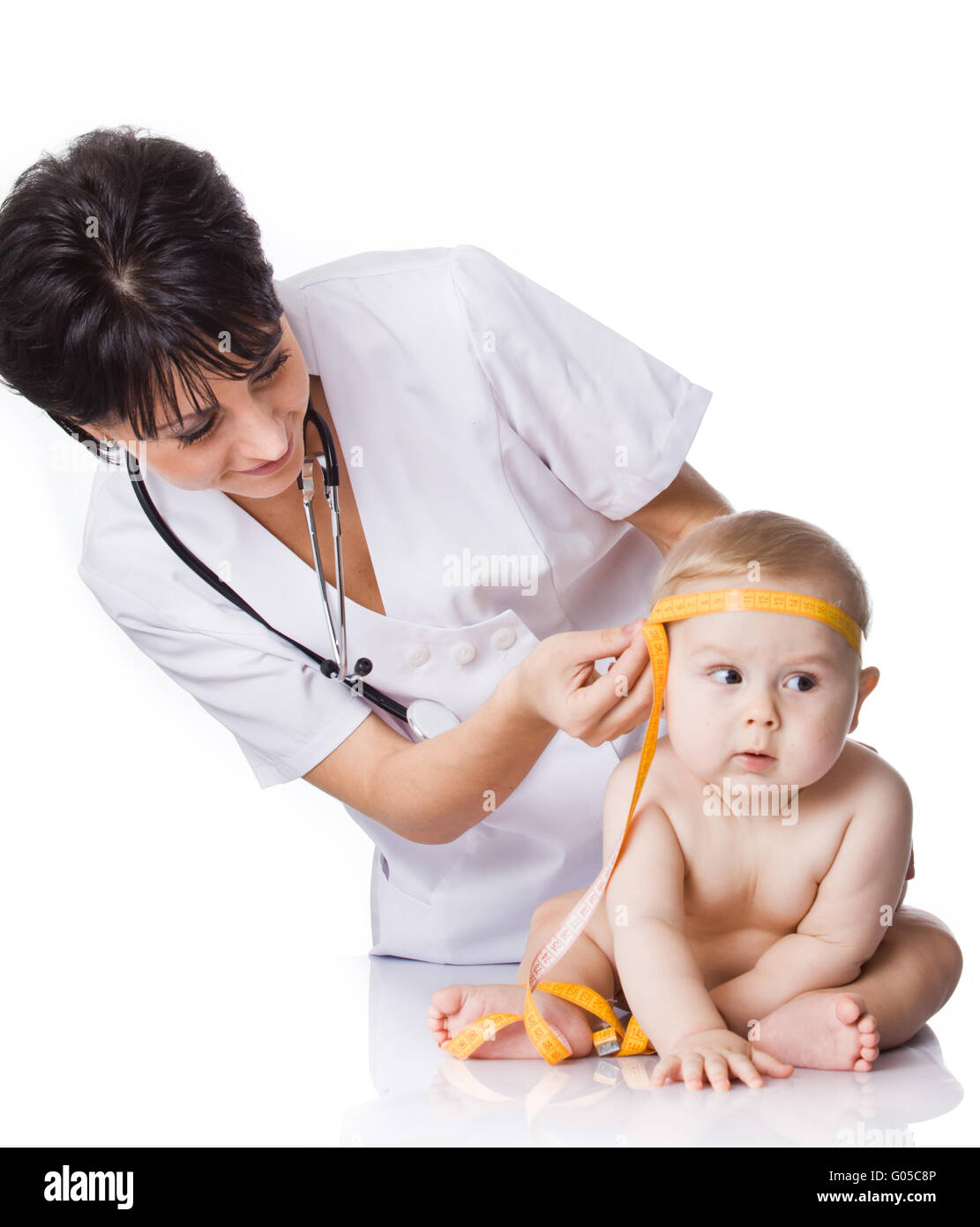 beautiful doctor and baby on a white background. D Stock Photo - Alamy