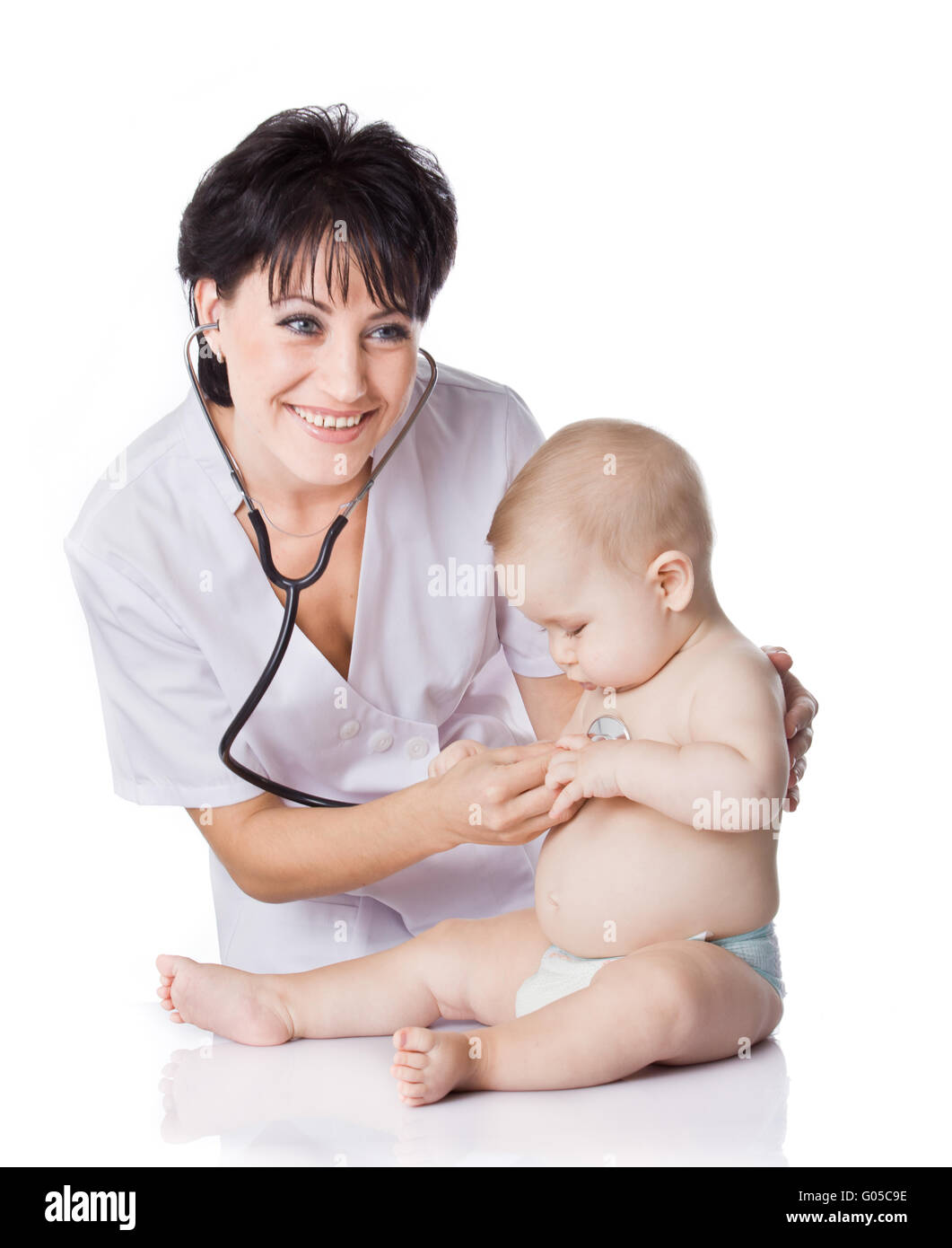 beautiful doctor and baby on a white background Stock Photo - Alamy