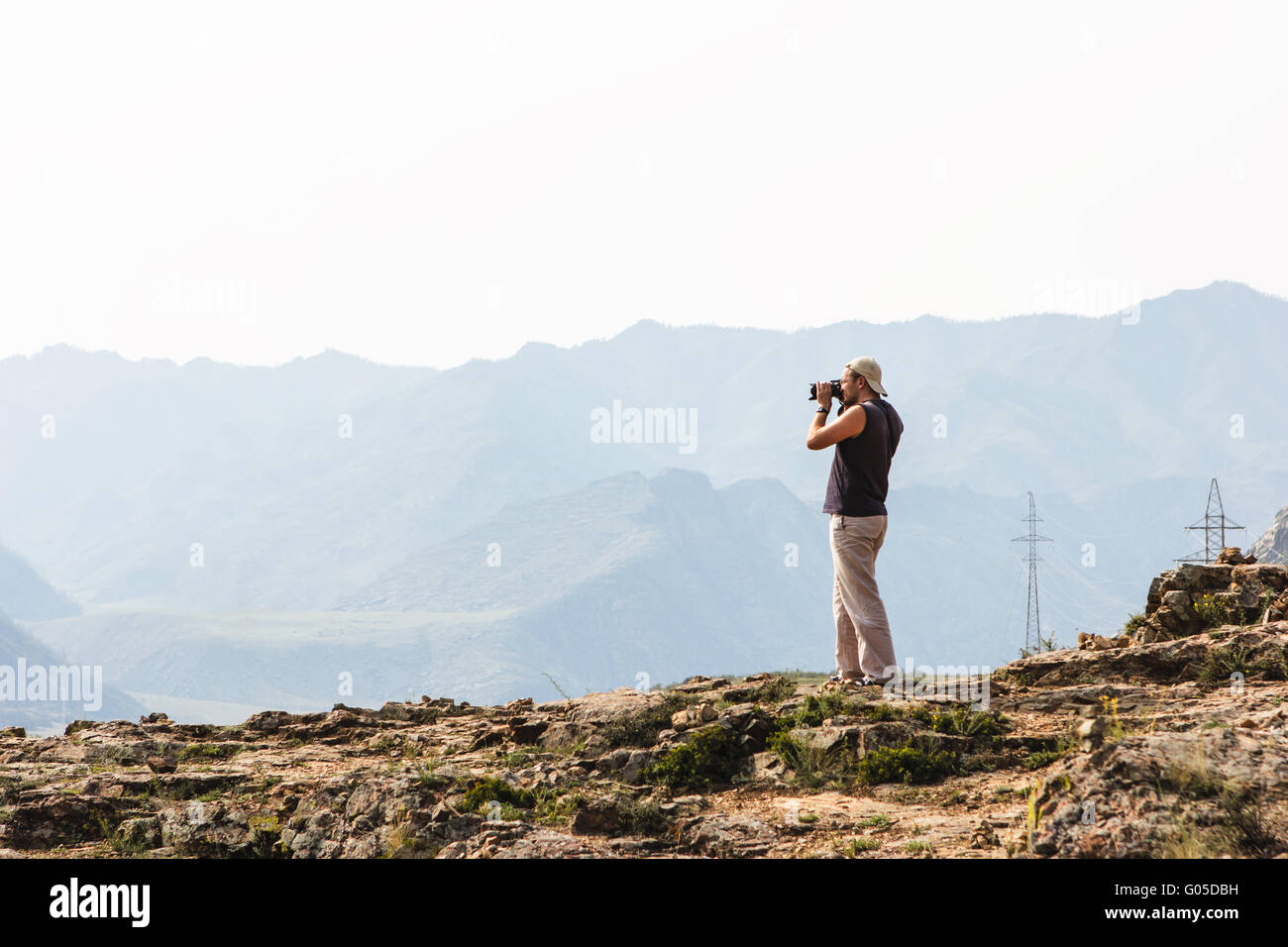Nature photographer with digital camera on top of the mountain Stock ...
