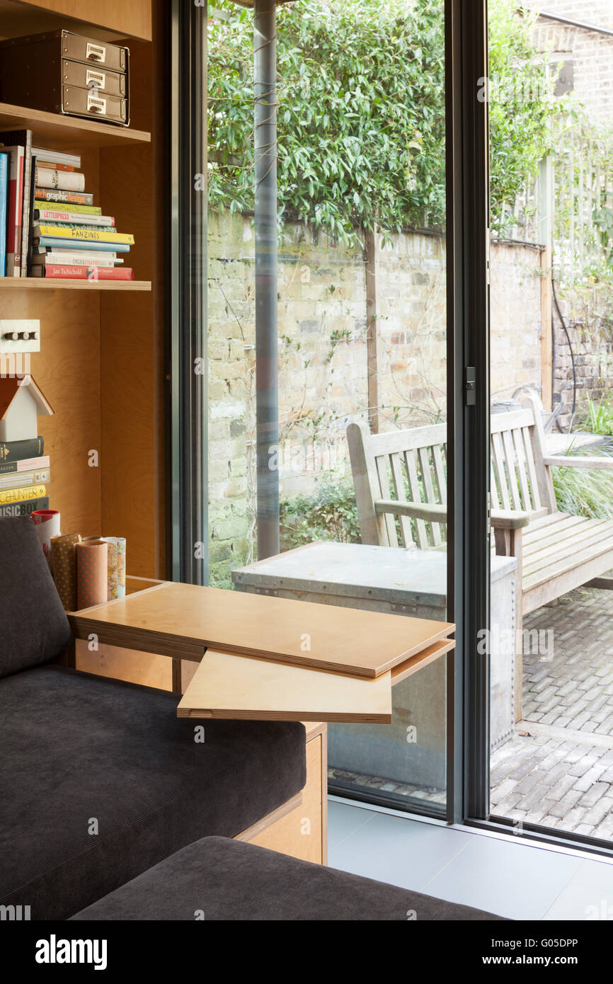 Detail of sofa table open. London townhouse, London, United Kingdom ...