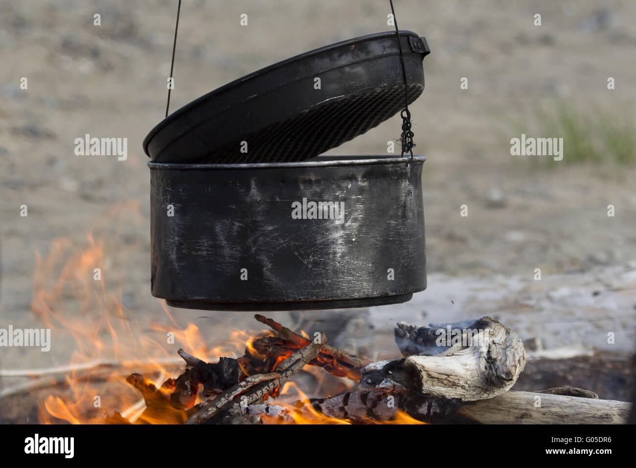 cooking pot on campfire Stock Photo - Alamy