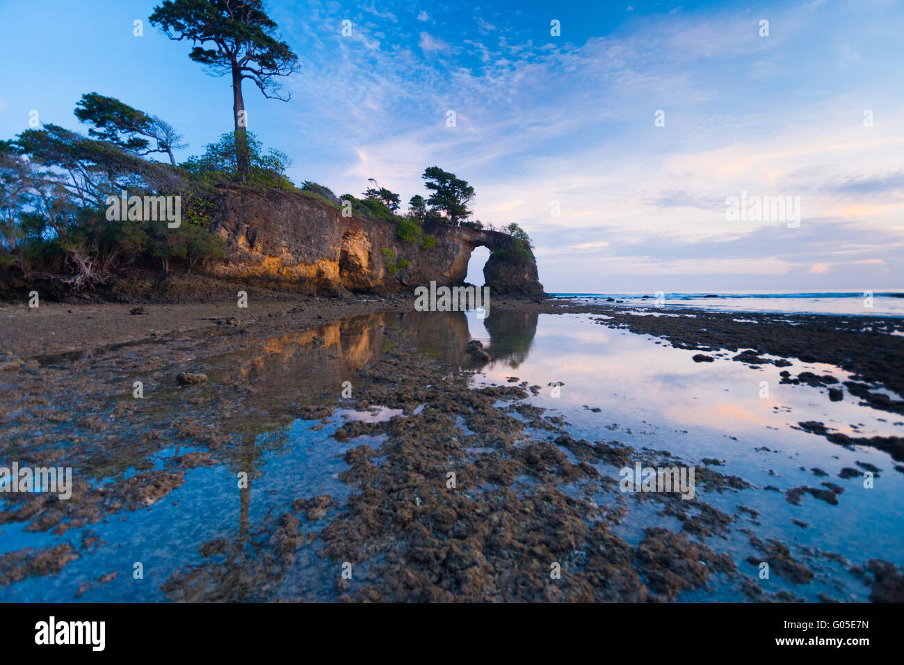 Natural Bridge Trees Low Tide Reflection Sunset Stock Photo - Alamy
