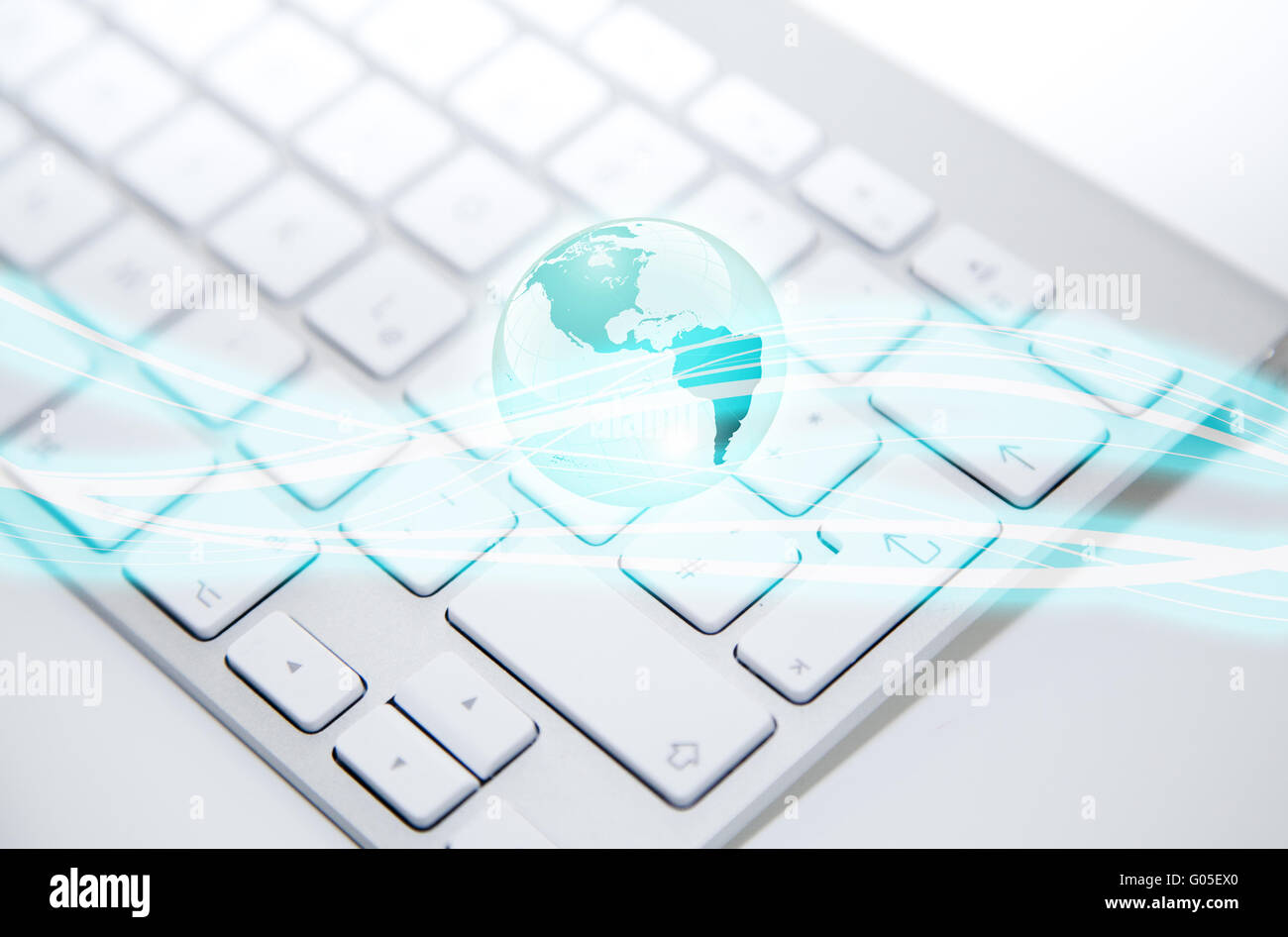White computer keyboard with blue globe and lights Stock Photo - Alamy