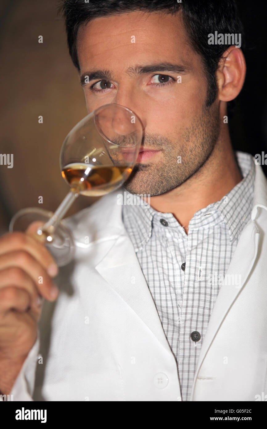 man tasting wine Stock Photo - Alamy