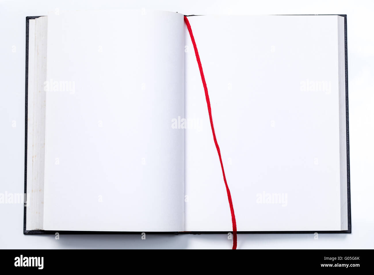 Blank book open with red ribbon and white pages Stock Photo - Alamy