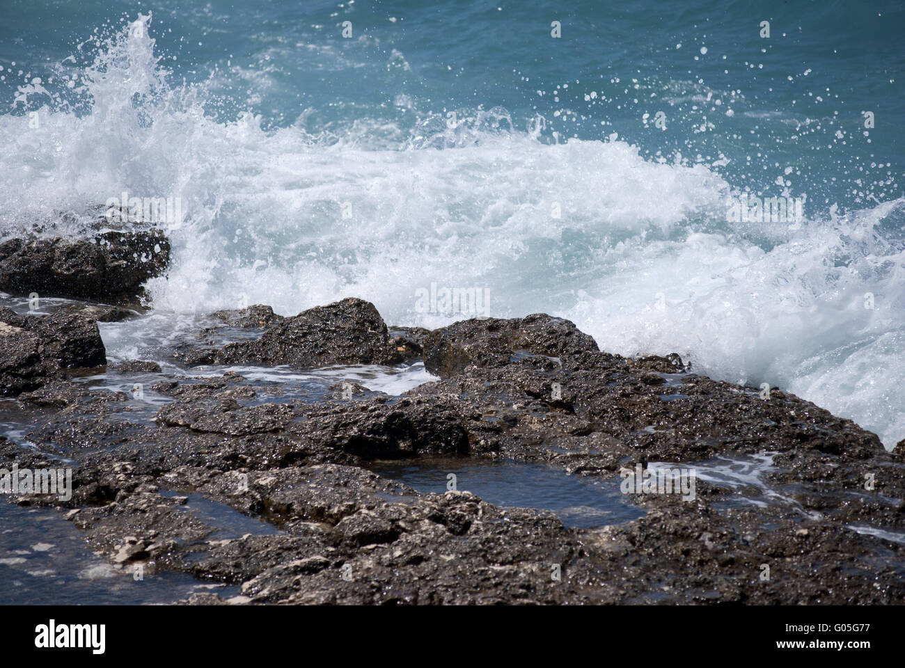 splash on the rocks Stock Photo - Alamy