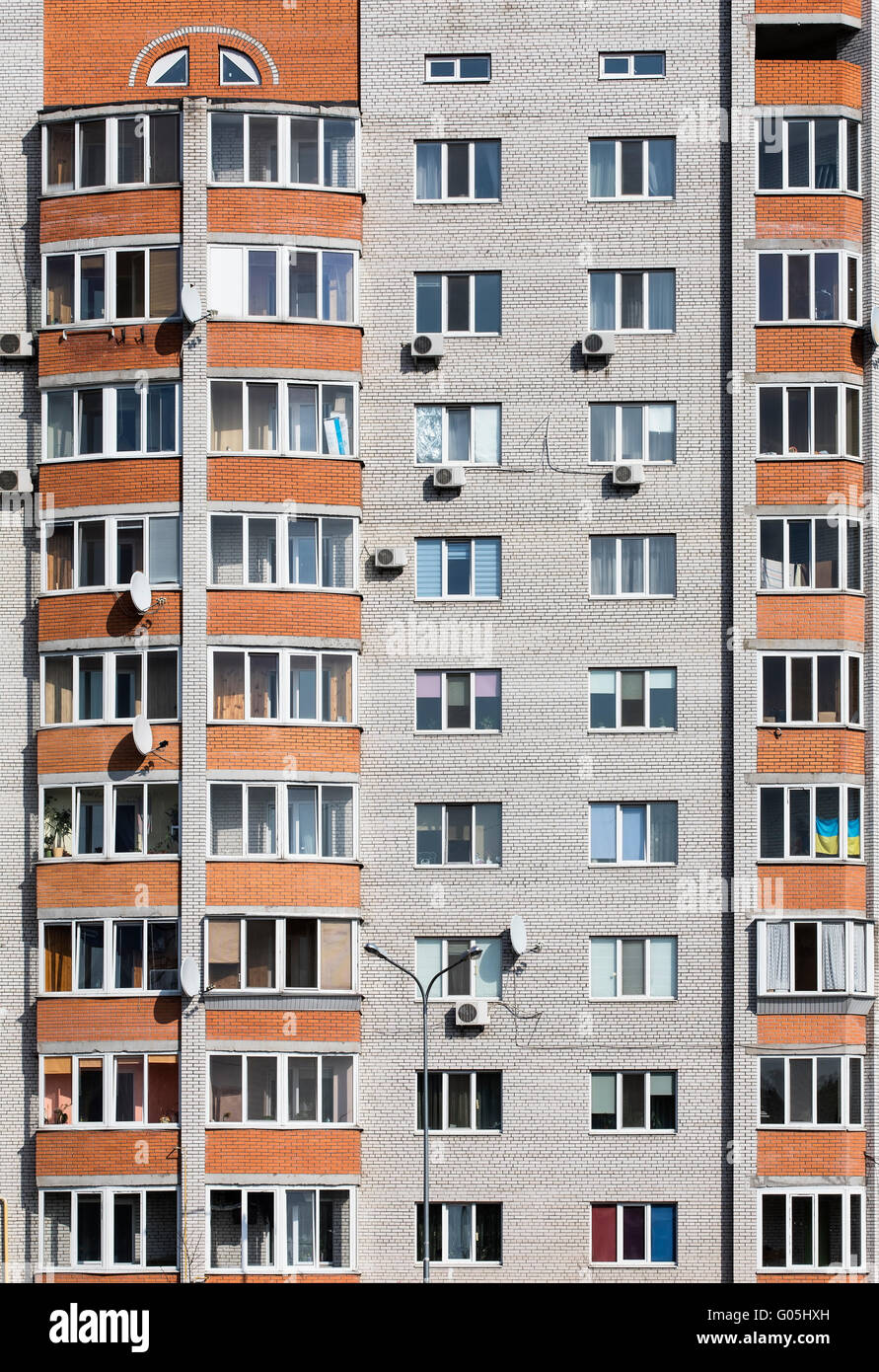 Wall of a residential block of flats with balconies windows Stock Photo ...