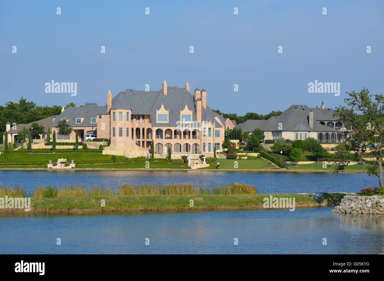 View from across the lake Stock Photo - Alamy