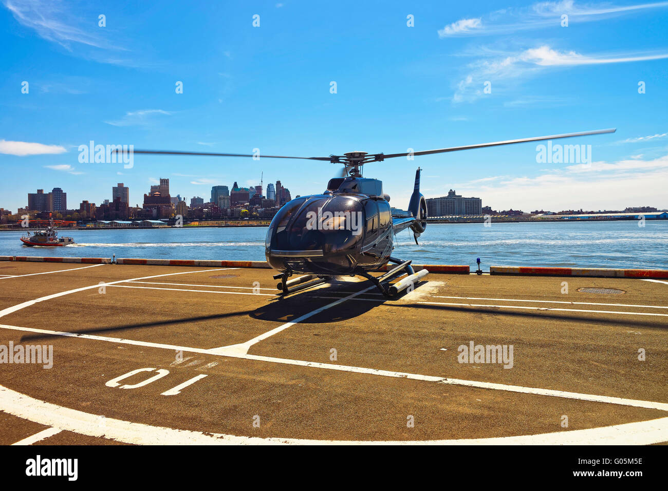 Black Helicopter on helipad in Lower Manhattan New York, USA, on East ...