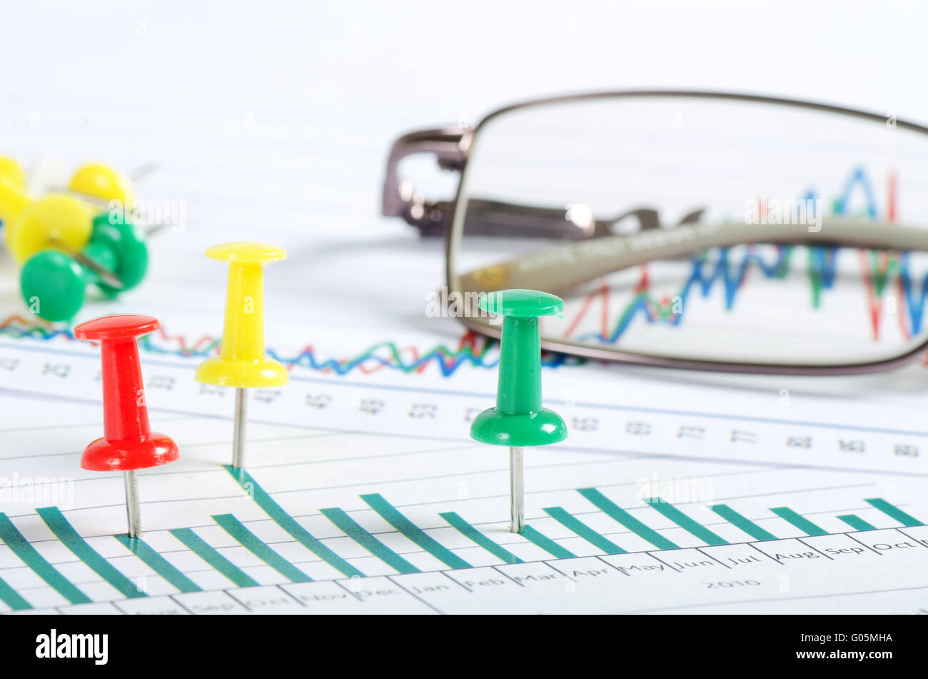 Graphs, charts with multi-coloured push buttons Stock Photo - Alamy