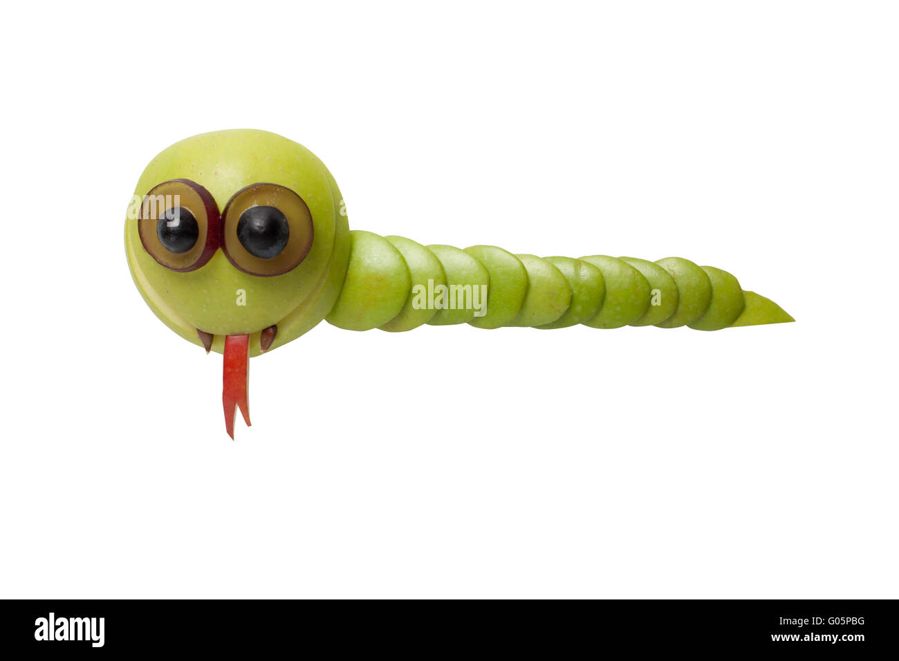 Viper made of green apple on isolated background Stock Photo - Alamy