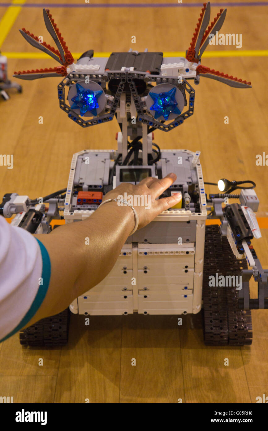 Robot interacting with human Stock Photo - Alamy