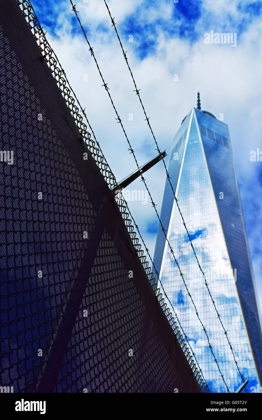 NEW YORK, USA - APRIL 24, 2015: One World Trade Center and barbed wire ...