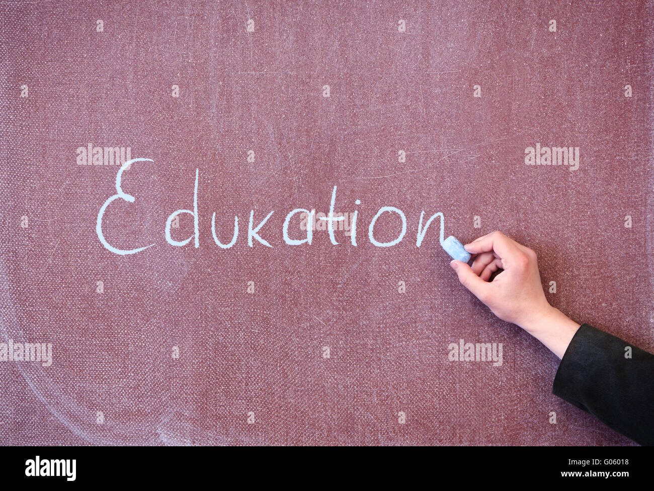 Word education written on the blackboard with chalk Stock Photo - Alamy
