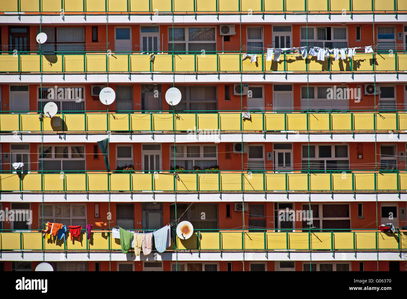 Housing complex with balconys and sattelite dishes Stock Photo - Alamy