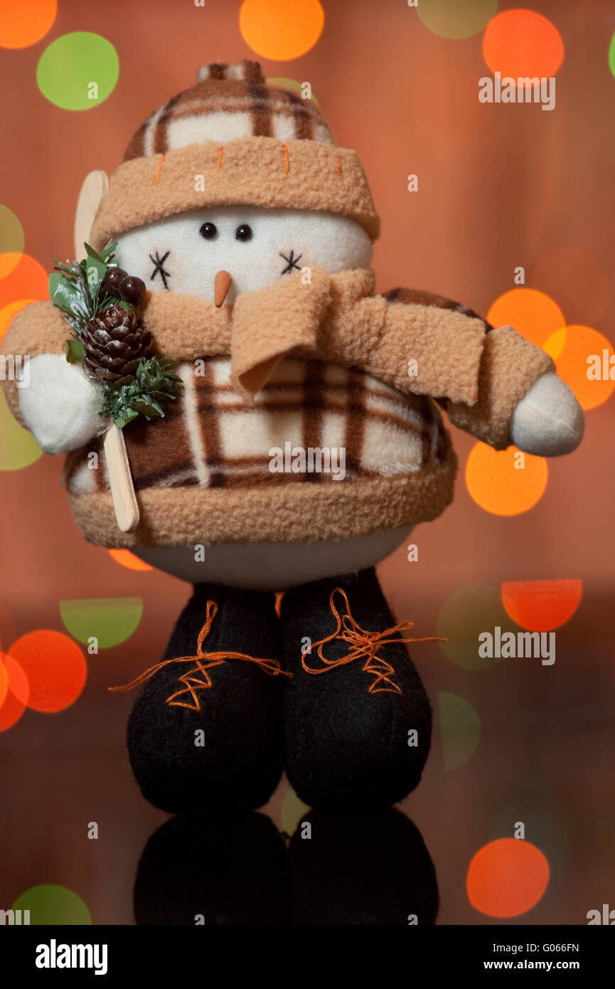 Snowman - a Christmas toy on a fir-tree Stock Photo - Alamy