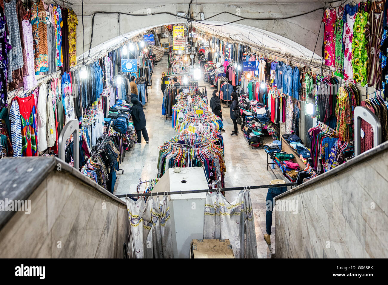 Passage beneath a busy street in Tehran, Iran, is a clothing store ...