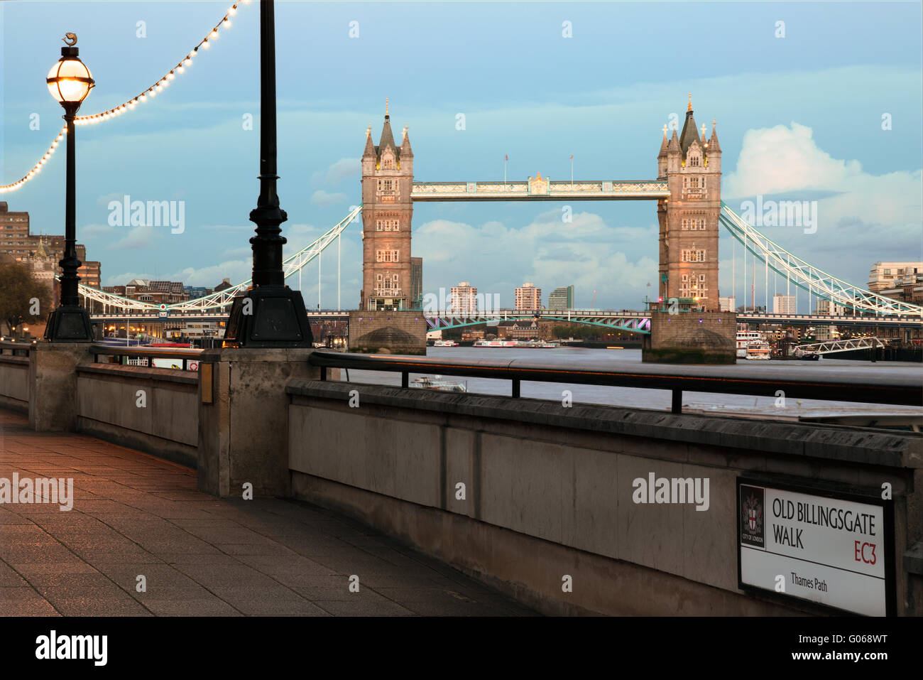 Evening view of Tower Bridge in London from Old Billingsgate Walk ...