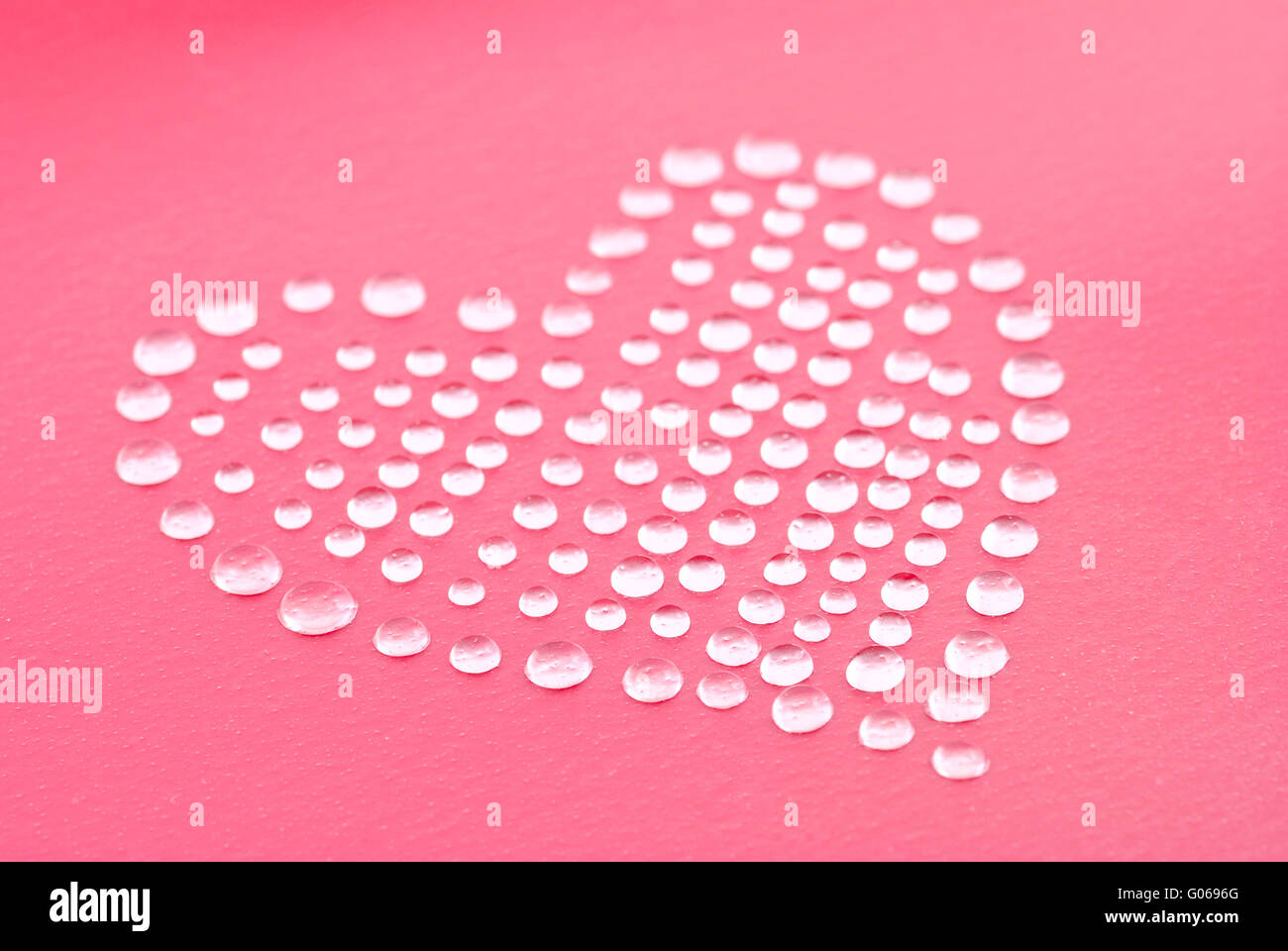 Red heart shape made of water droplets Stock Photo - Alamy
