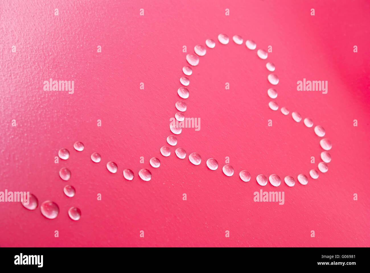 Red heart shape made of water droplets Stock Photo - Alamy