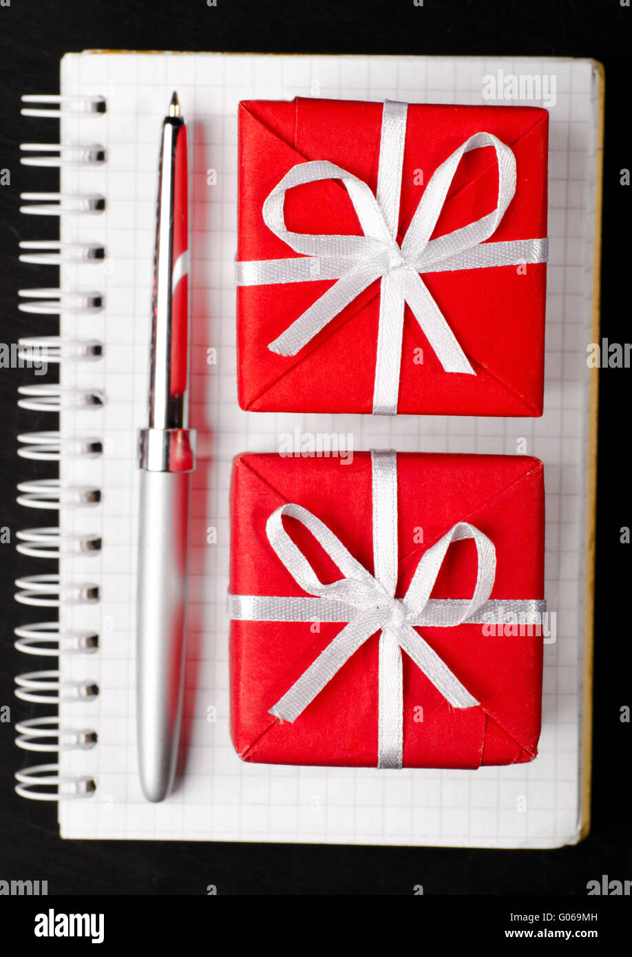 gift boxes with notepad Stock Photo - Alamy