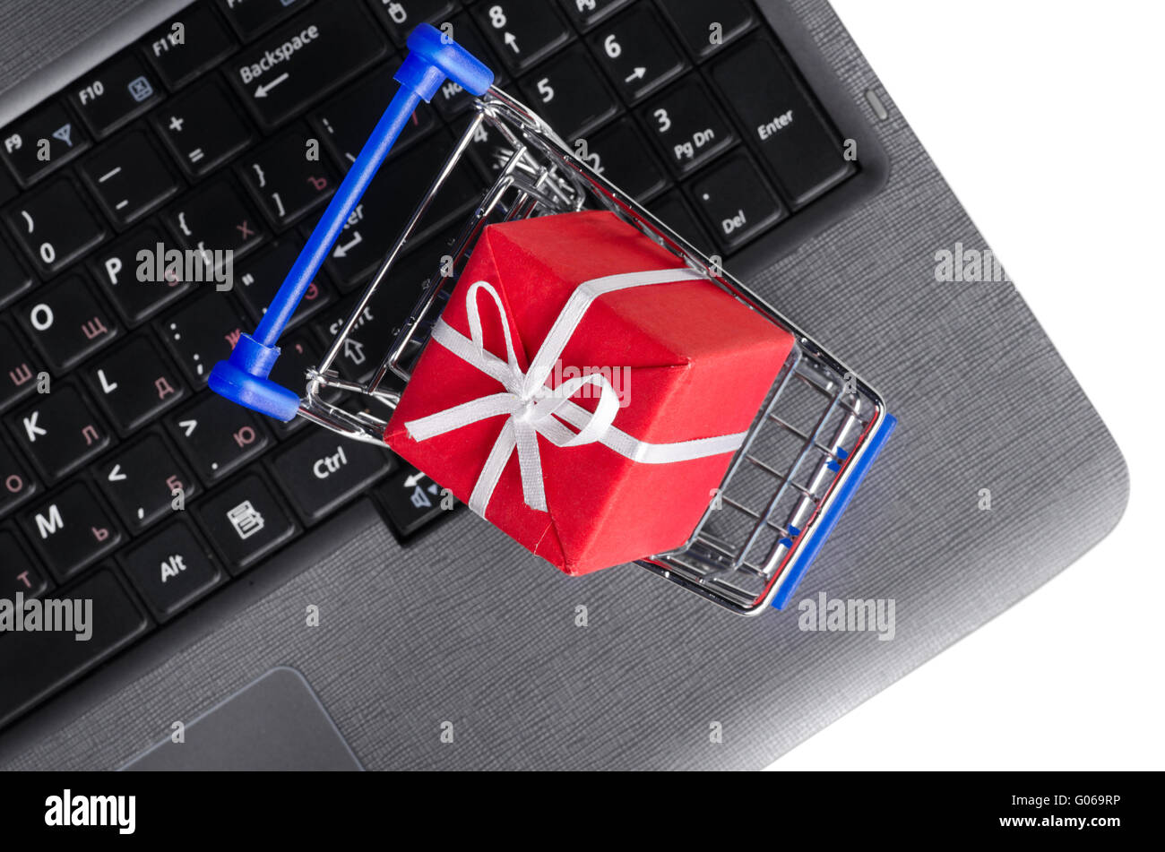 gift on a laptop keyboard Stock Photo - Alamy