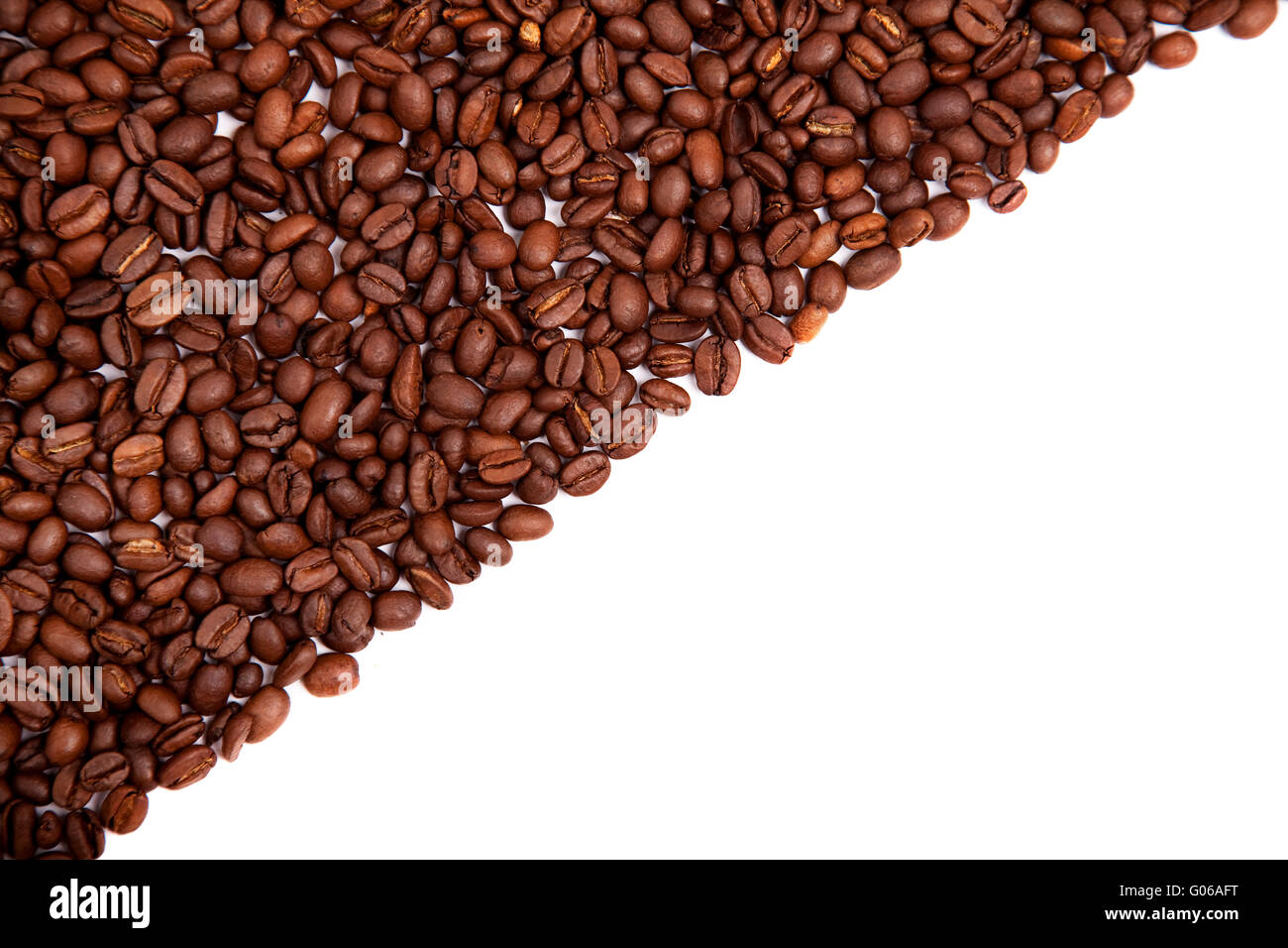 Coffee beans in diagonal layout on white Stock Photo - Alamy