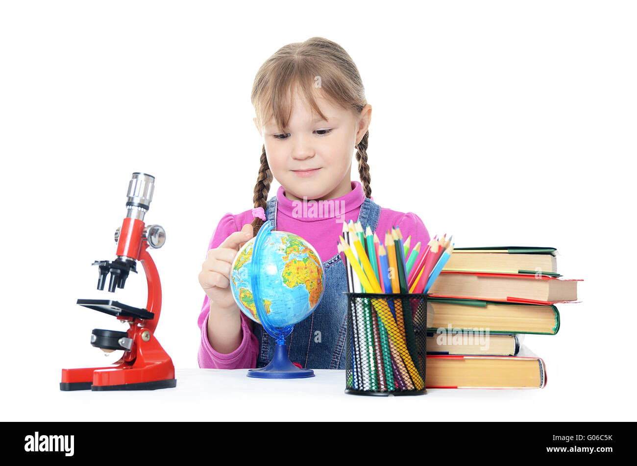 The little girl learn isolated on white background Stock Photo - Alamy