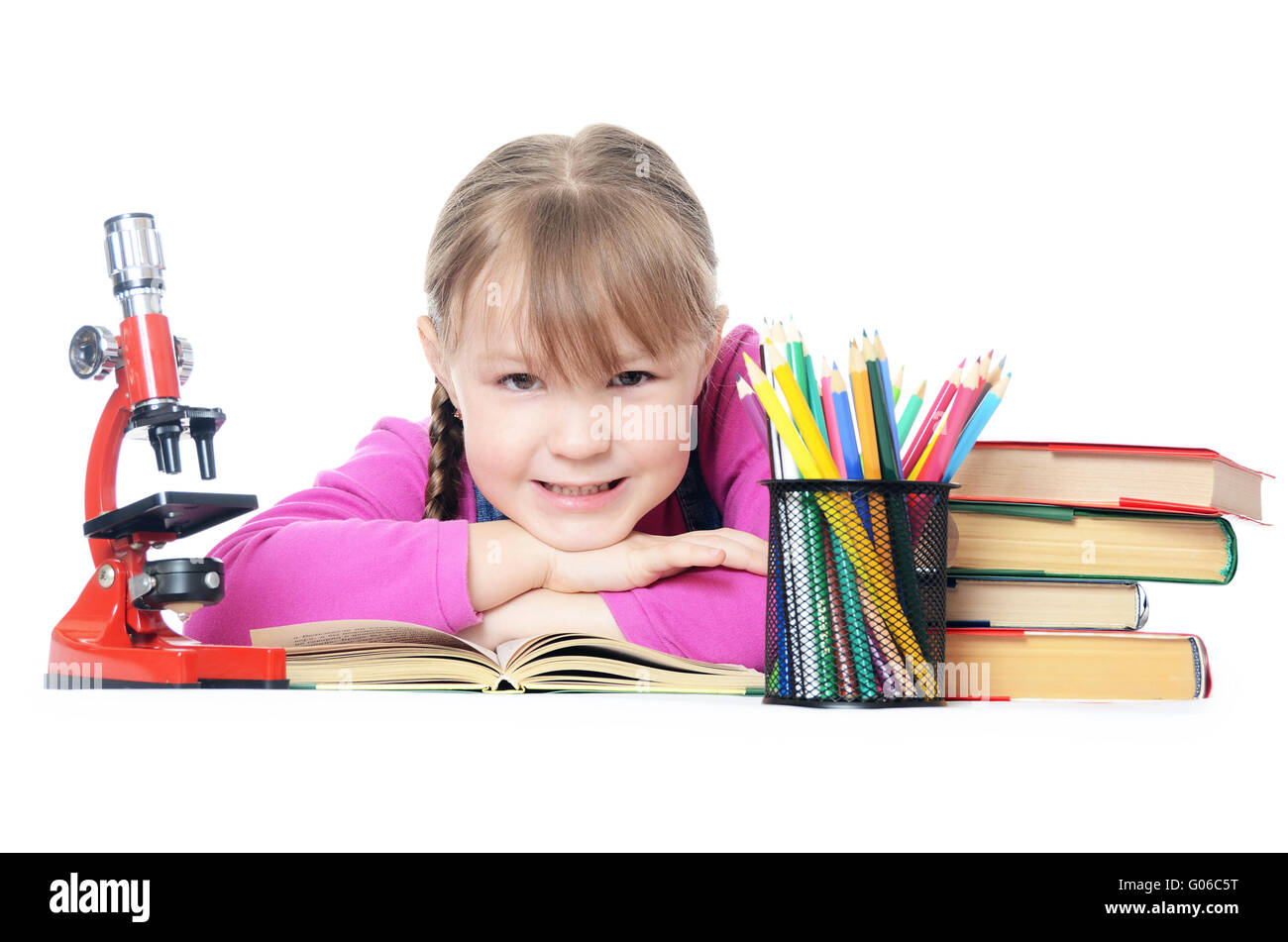 The little girl learn isolated on white background Stock Photo - Alamy