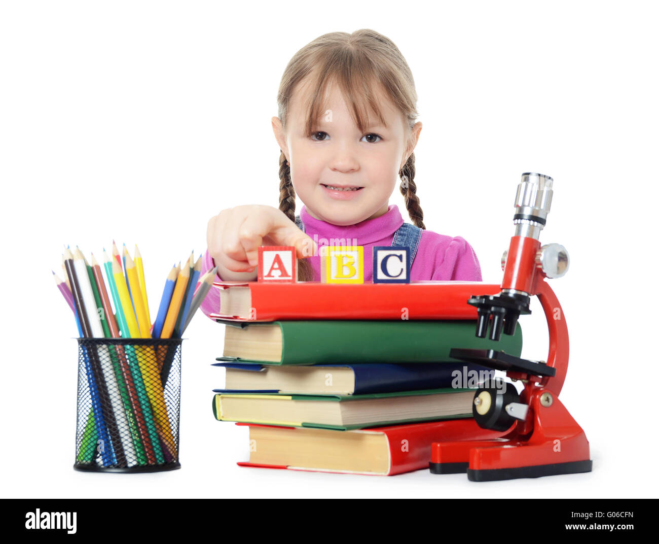The little girl learn isolated on white background Stock Photo - Alamy