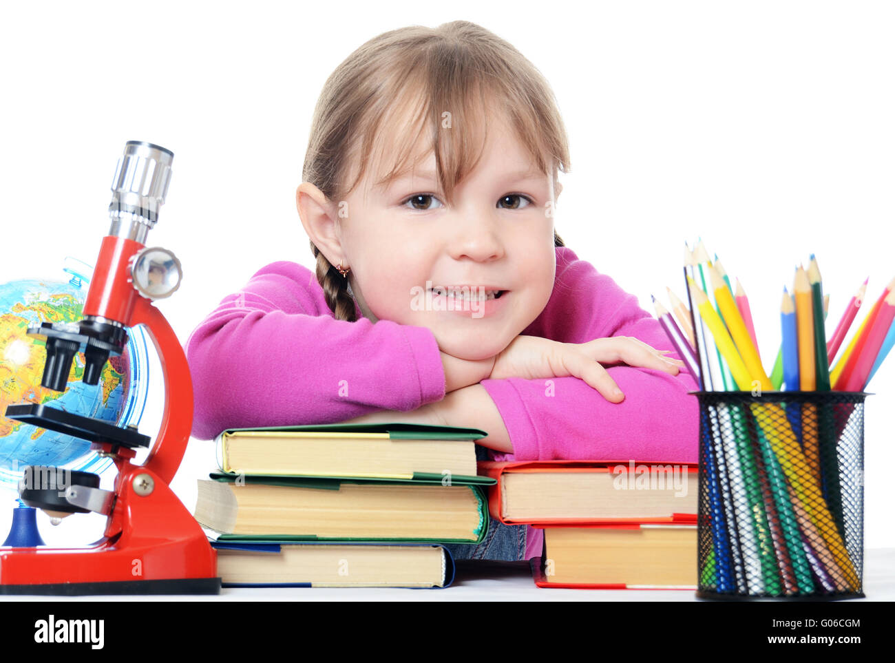 The little girl learn isolated on white background Stock Photo - Alamy