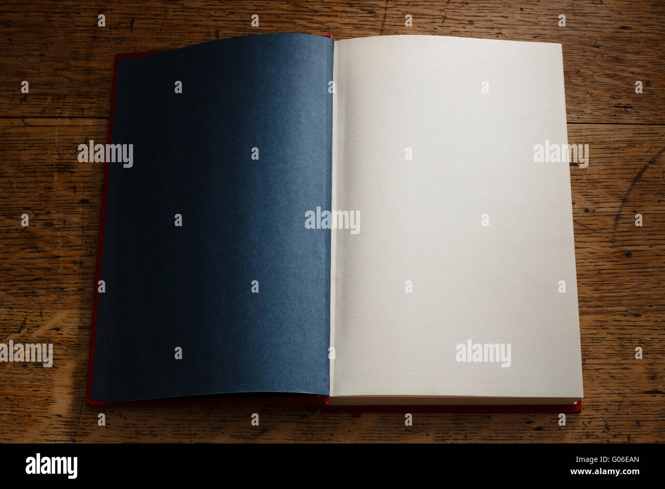 Open book on title page with blank pages on oak background Stock Photo ...