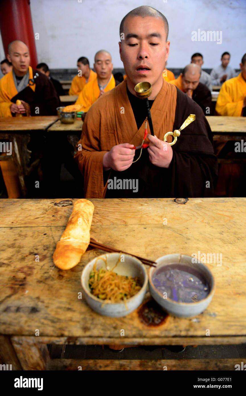 Zhengzhou, China's Henan Province. 29th Apr, 2016. Monks chant ...