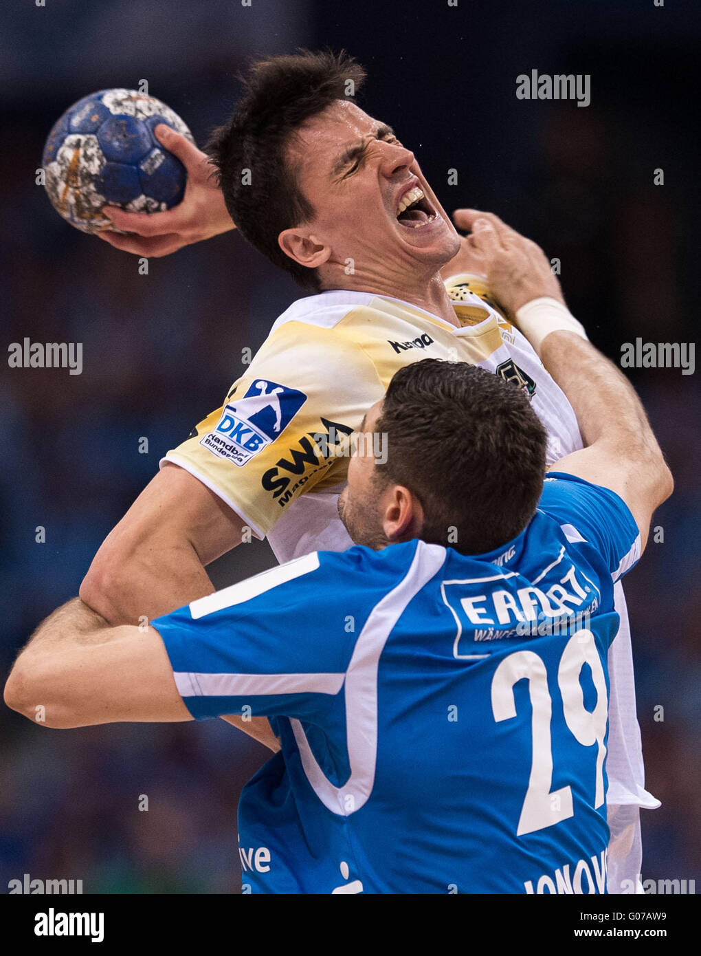 Hamburg, Germany. 30th Apr, 2016. Magdeburg's Nemanja Zelenovic (toip ...