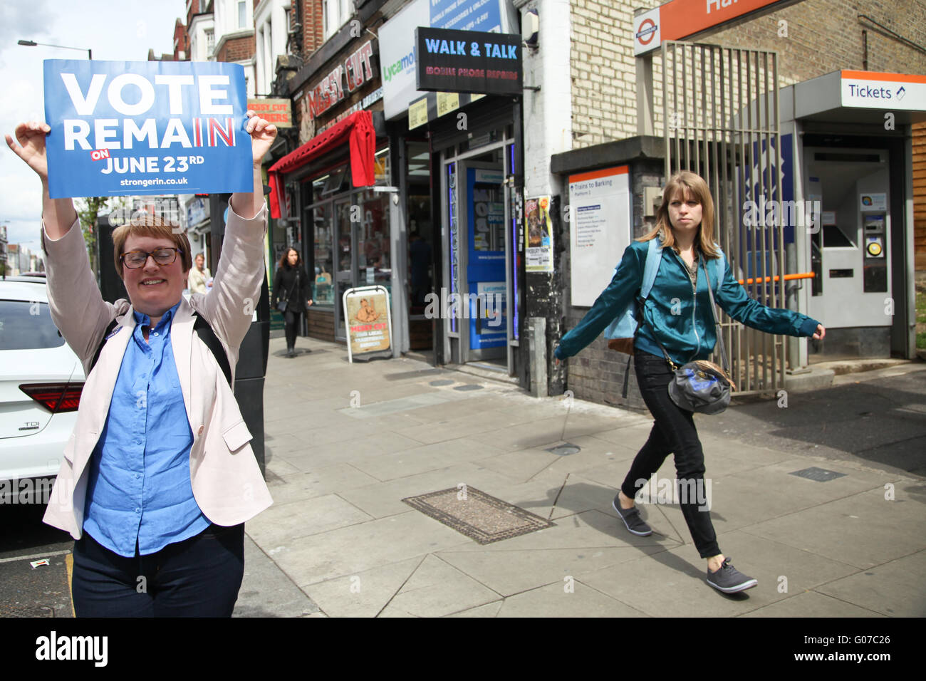 North London, 30 April 2016 - Campaigner holding a campaign poster ...