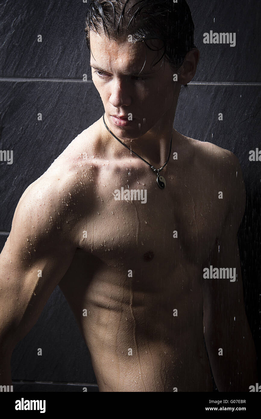 A Man under Shower Stock Photo - Alamy