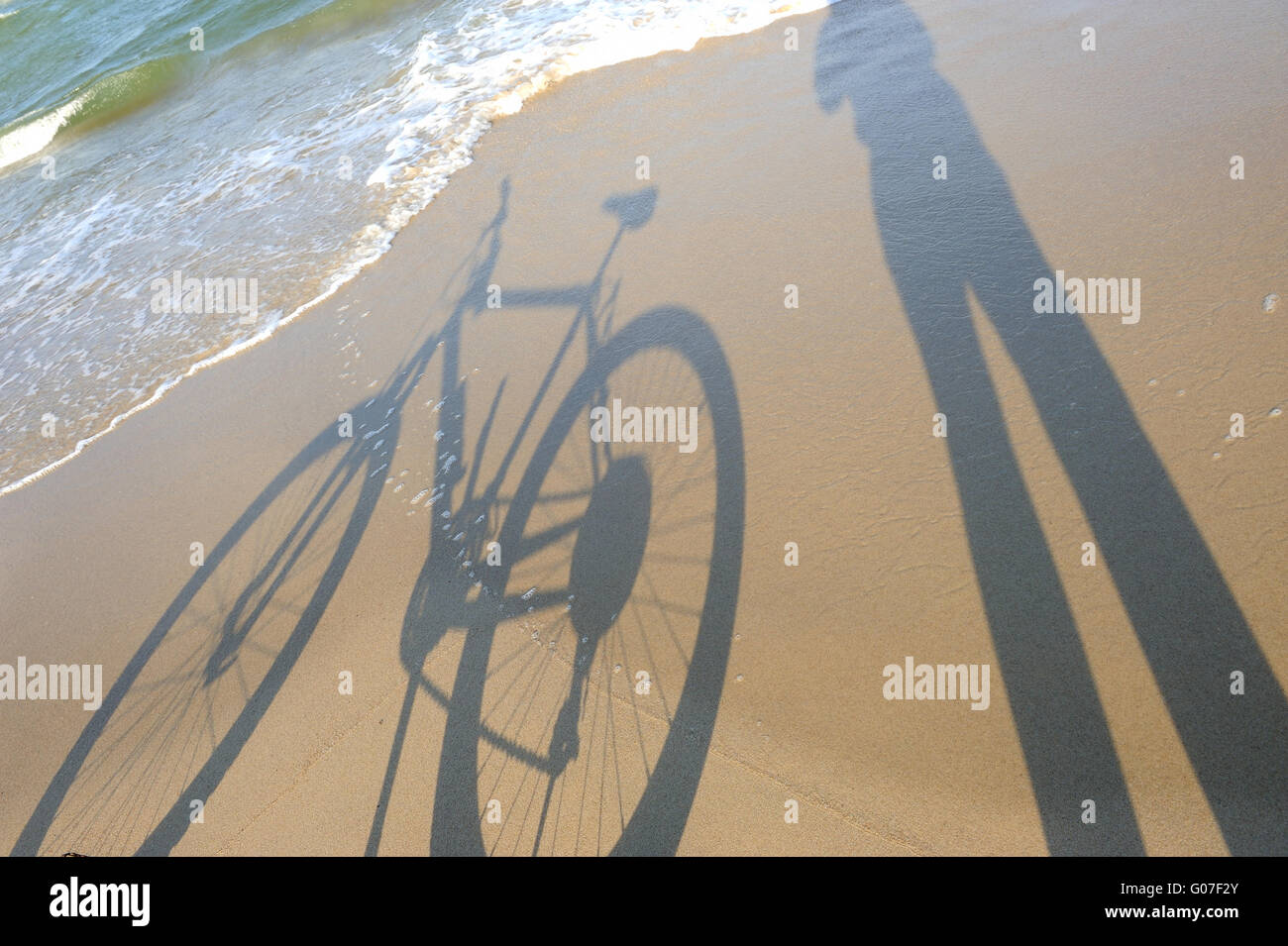 Bike on the sand Stock Photo - Alamy